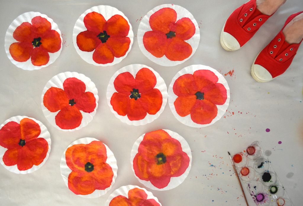 Children paint poppies using coffee filters and liquid watercolors ...